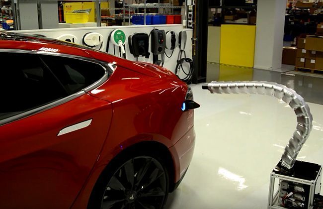 'Snakebot' Charges the Tesla Model S [Amazing Video] | CarDekho.com